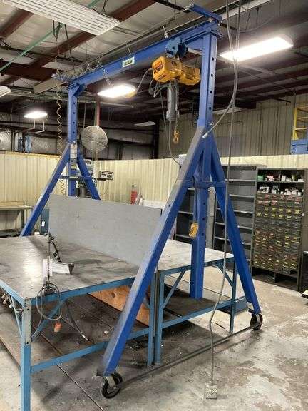 Vestil 2000 pound portable A frame hoist, tables - Legacy Auction Company