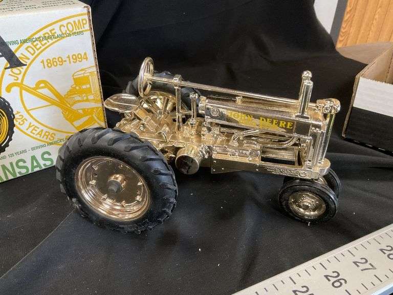 John Deere A gold tractor - Legacy Auction Company