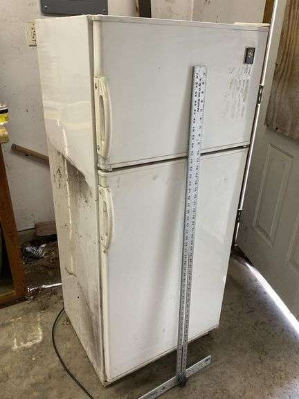 General Electric refrigerator, works great! - Legacy Auction Company