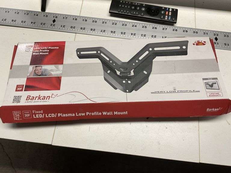 Vizio 31 inch TV with remote and mount - Legacy Auction Company