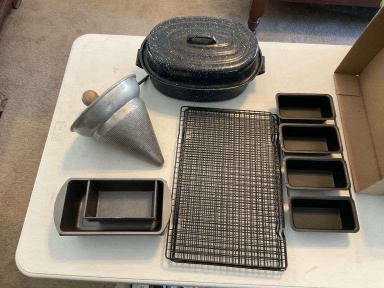 Roaster, bread pans, cooling racks etc. - Legacy Auction Company