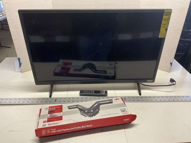 Vizio 31 inch TV with remote and mount - Legacy Auction Company