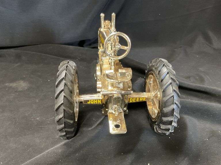 John Deere A gold tractor - Legacy Auction Company