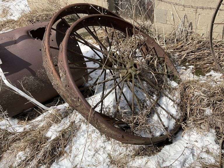 2-48" steel wheels, some rust - Legacy Auction Company