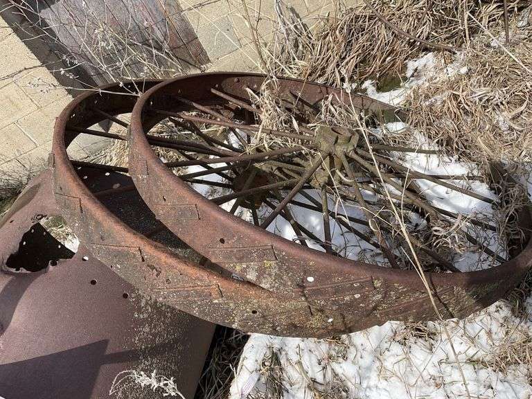 2-48" steel wheels, some rust - Legacy Auction Company