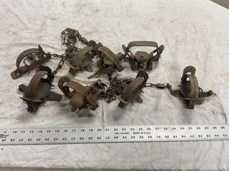 (8) 1 1/2 foot traps - Legacy Auction Company