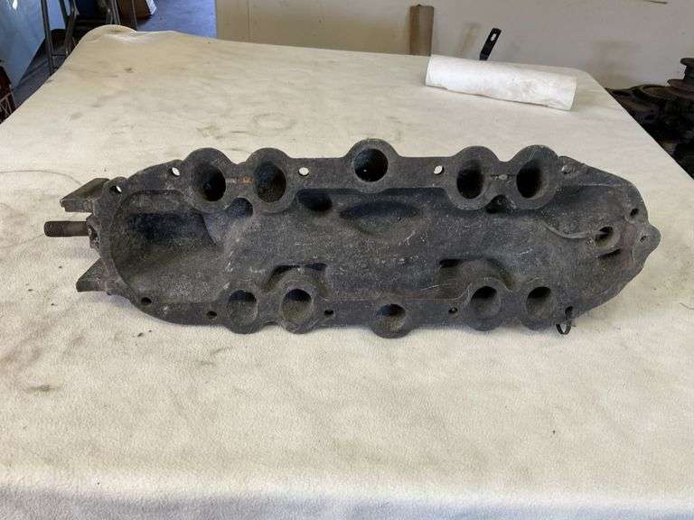 Ford flathead v8 2 barrel intake manifold - Legacy Auction Company