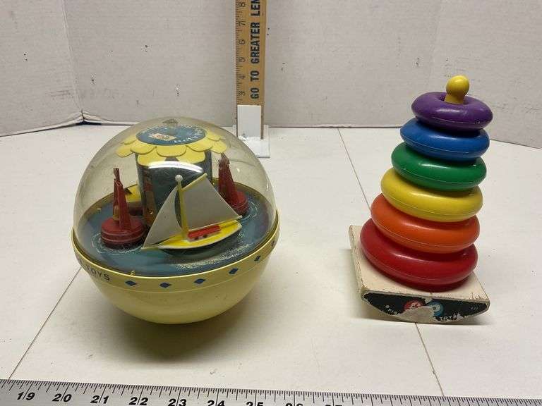 Fisher-Price Roly Poly Boat Chime and colored - Legacy Auction Company