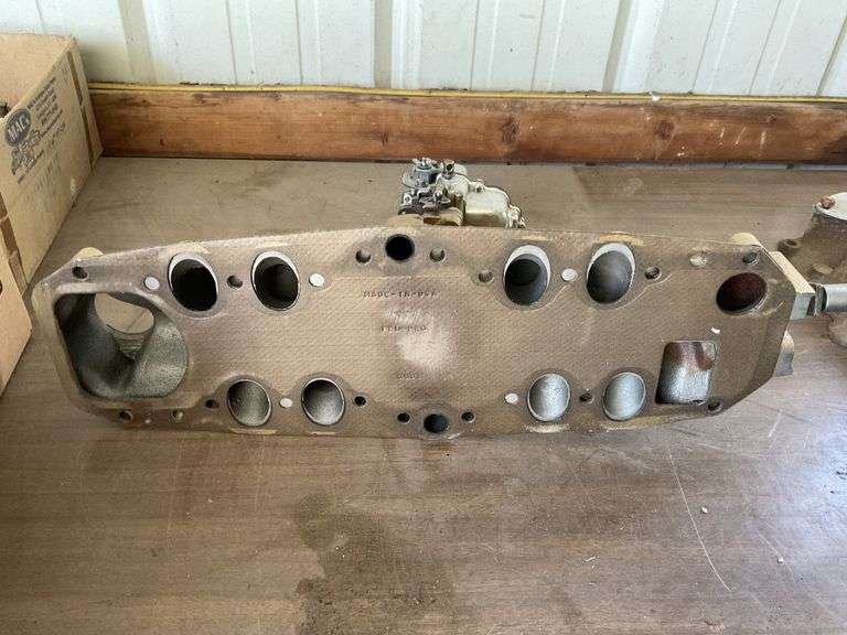 Ford flathead v8 2 barrel intake manifold with - Legacy Auction Company