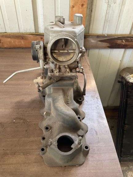 Ford flathead v8 2 barrel intake manifold with - Legacy Auction Company
