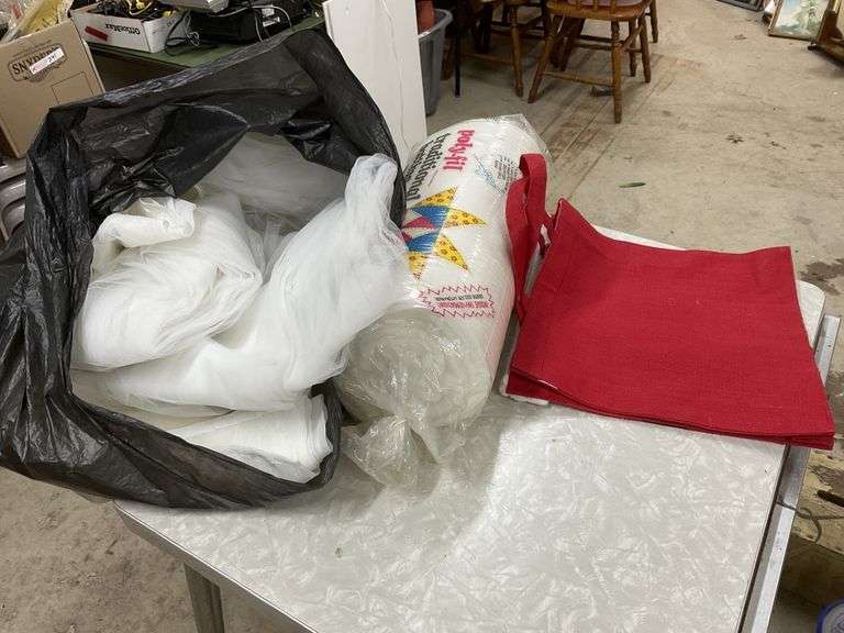 Batting, netting, roll of paper - Legacy Auction Company