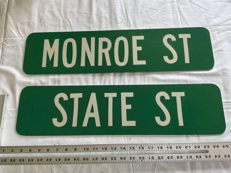 Double sided new street signs - Legacy Auction Company