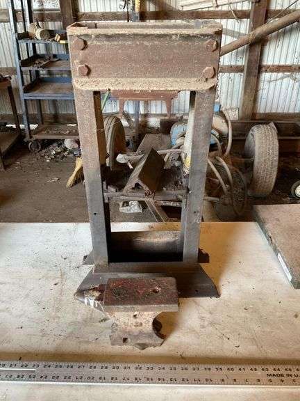 Press and anvil - Legacy Auction Company