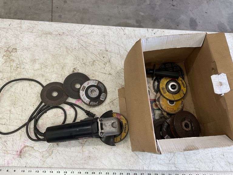 Sears 4 1/2 inch disc grinder and assorted discs - Legacy Auction Company