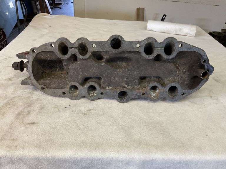 Ford flathead v8 2 barrel intake manifold - Legacy Auction Company