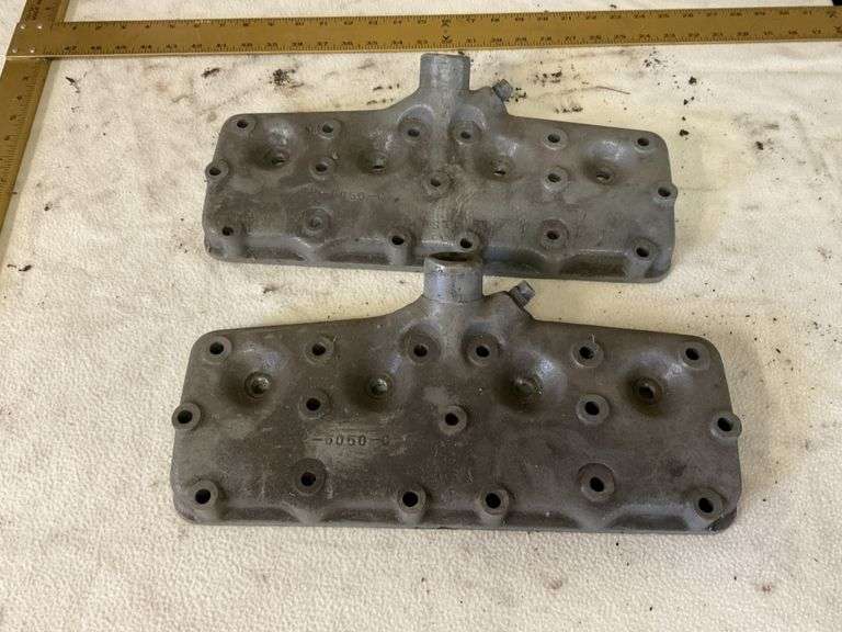 2 Ford flathead v8 heads - Legacy Auction Company