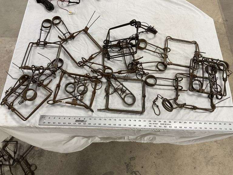(10) conibear 220 traps - Legacy Auction Company
