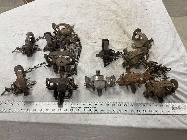 (12) 1 1/2 foot traps - Legacy Auction Company