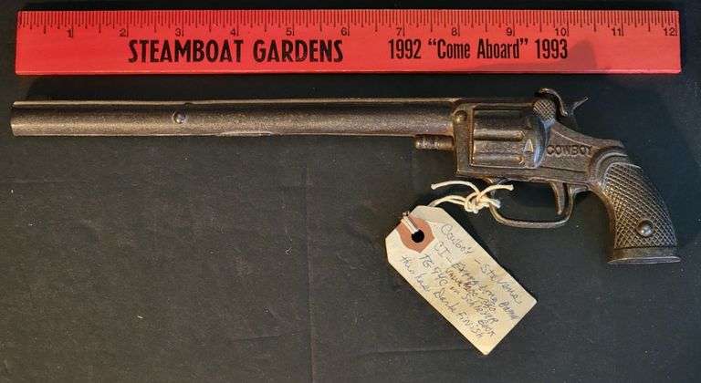 Cast Iron "Cowboy" Long Barrel Revolver Toy Gun - Legacy Auction Company