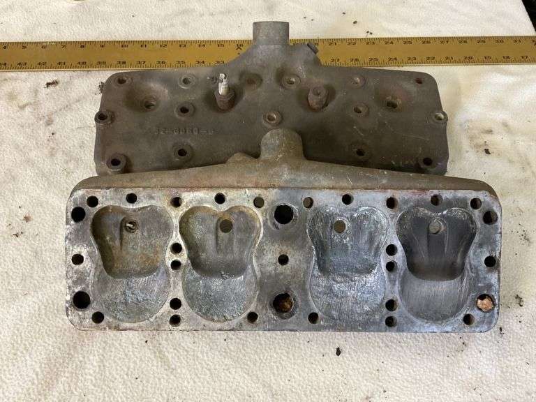 2 aluminum Ford flathead v8 heads - Legacy Auction Company