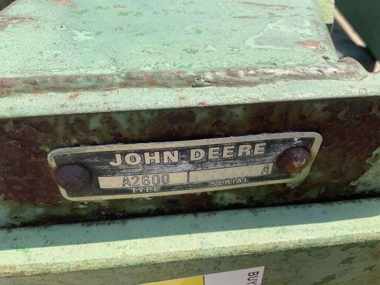 John Deere 2600 on land plow - Legacy Auction Company