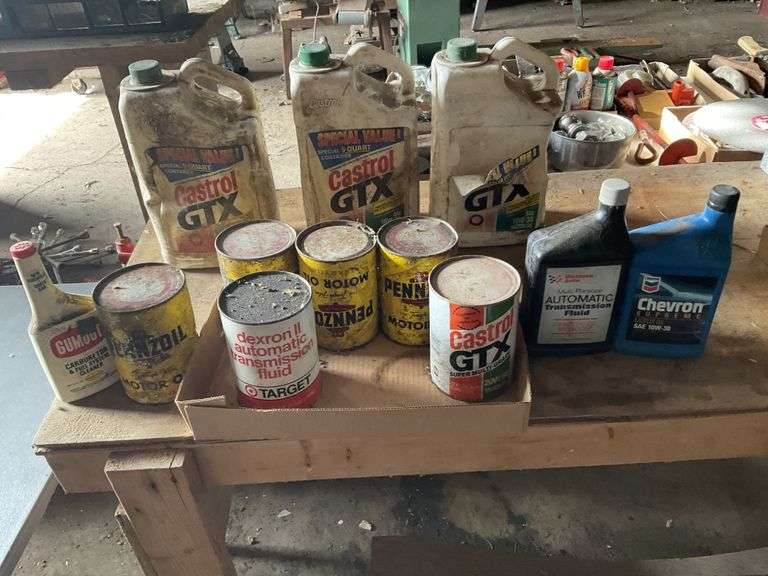 Castrol GTX SAE10W-30 etc. All containers are - Legacy Auction Company