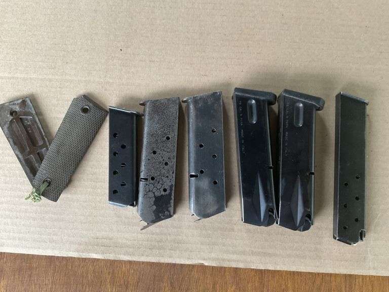 Hand gun clips, grips - Legacy Auction Company