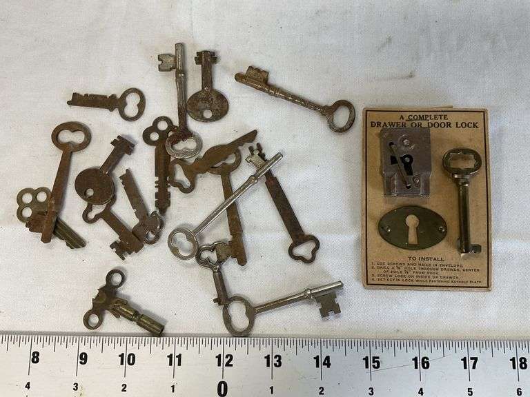 Antique door locks set, skeleton keys and watch - Legacy Auction Company