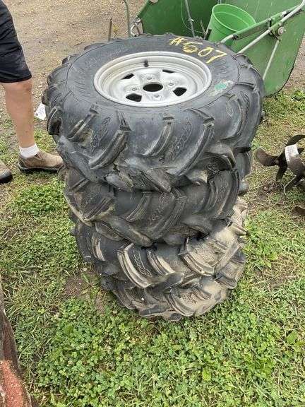 4- 4 wheeler tires and rims - Legacy Auction Company