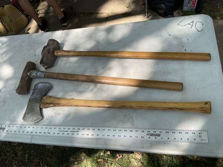 Double bit plumb axe and mauls - Legacy Auction Company