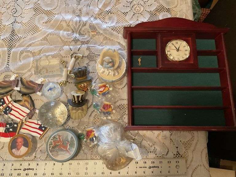 Wind chimes, kool-aid figures, clock shelf - Legacy Auction Company