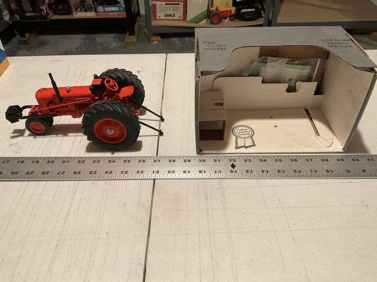Case DC pulling tractor - Legacy Auction Company