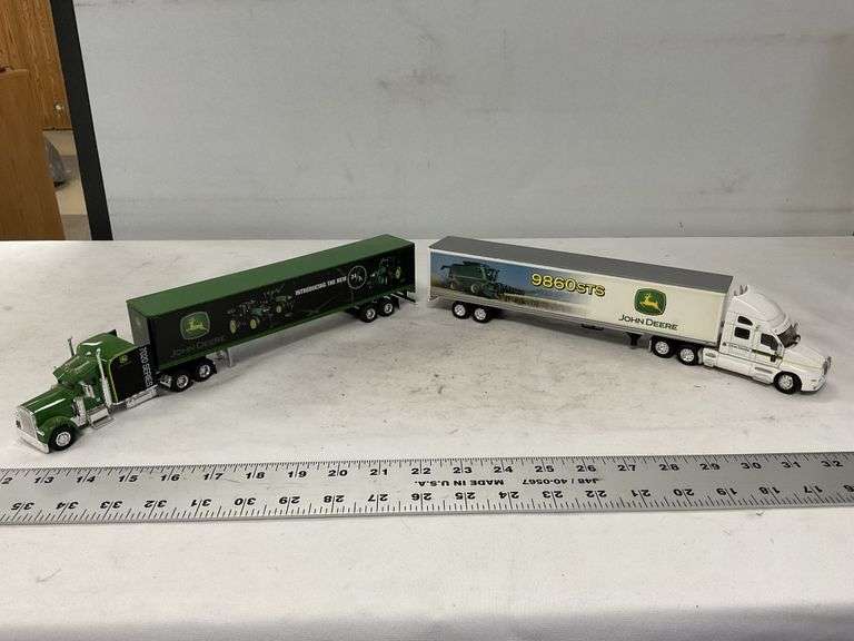 John Deere tractor trailers - Legacy Auction Company