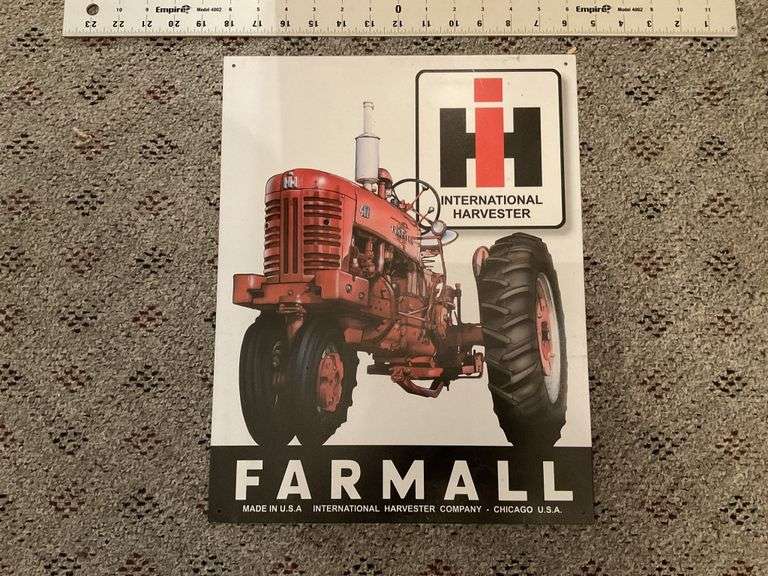 Farmall tin sign - Legacy Auction Company