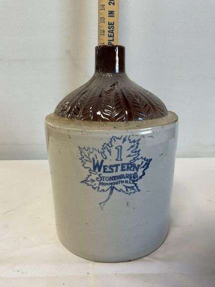 1 gallon western stoneware shoulder jug - Legacy Auction Company