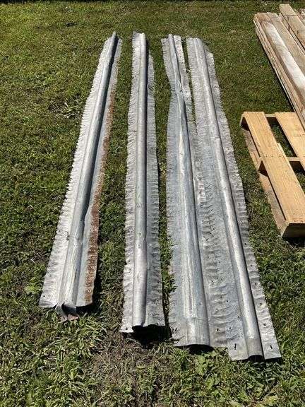 4- 10’ galvanized ridge cap - Legacy Auction Company