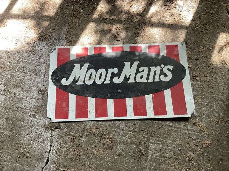 Vintage tin Moormans feed sign - Legacy Auction Company