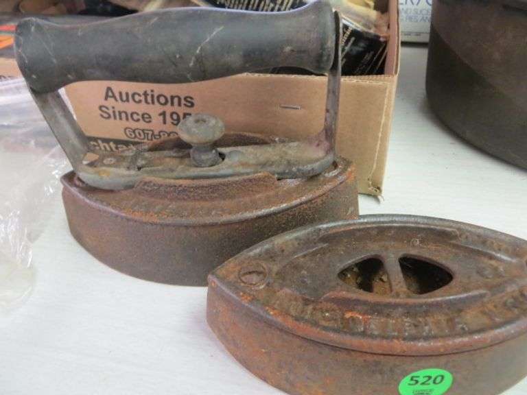 Two Flat Irons With a Handle - Lambrecht Auction, Inc.