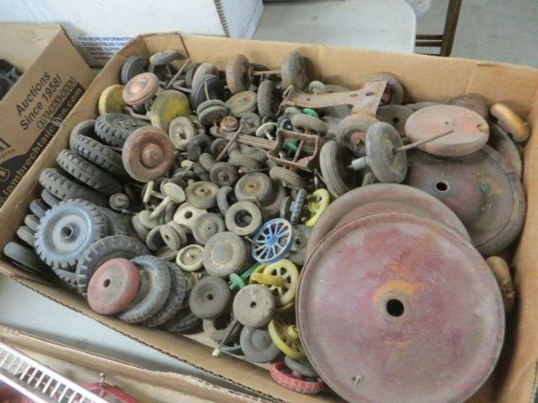 Box of Old Toy Wheels & Tires - Lambrecht Auction, Inc.
