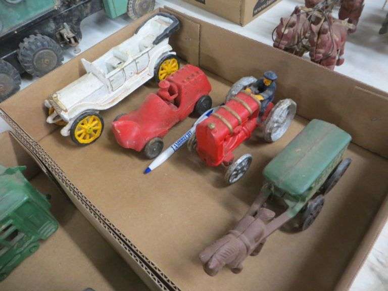 Cast Iron Reproduction Toys - Lambrecht Auction, Inc.