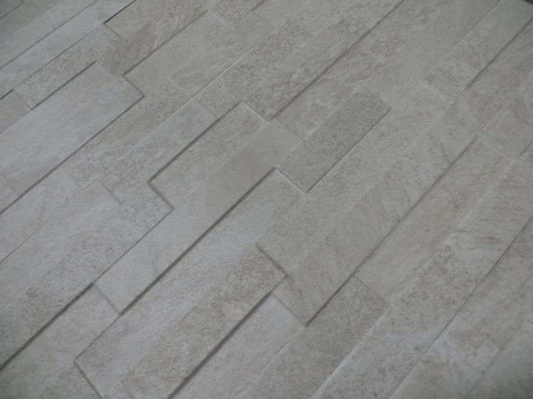 African Beige Ceramic Tile 9mm x 6" x 24" - Lambrecht Auction, Inc.