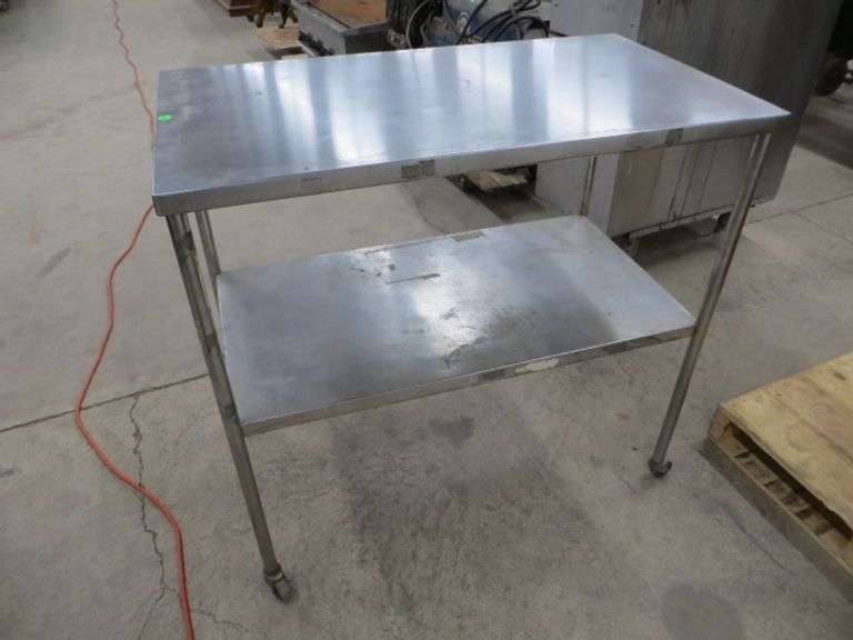 Heavy Stainless Steel Rolling Table - Lambrecht Auction, Inc.