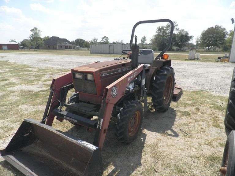 IH 244 Tractor with loader - Leap Auctions, LLC