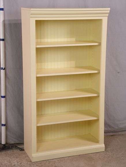 Cream colored open front bookcase; 74-7388 - R.H. Lee & Co. Auctioneers