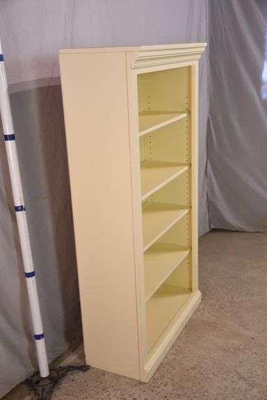 Cream colored open front bookcase; 74-7388 - R.H. Lee & Co. Auctioneers