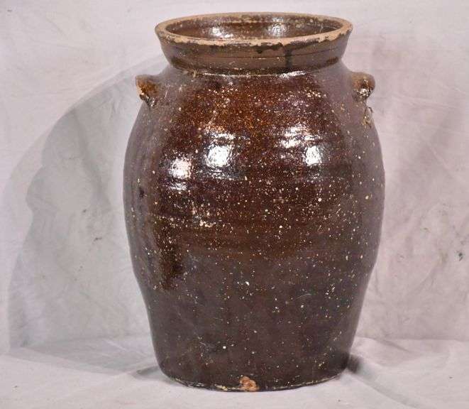 Dark brown pottery jug; 443-002 - R.H. Lee & Co. Auctioneers