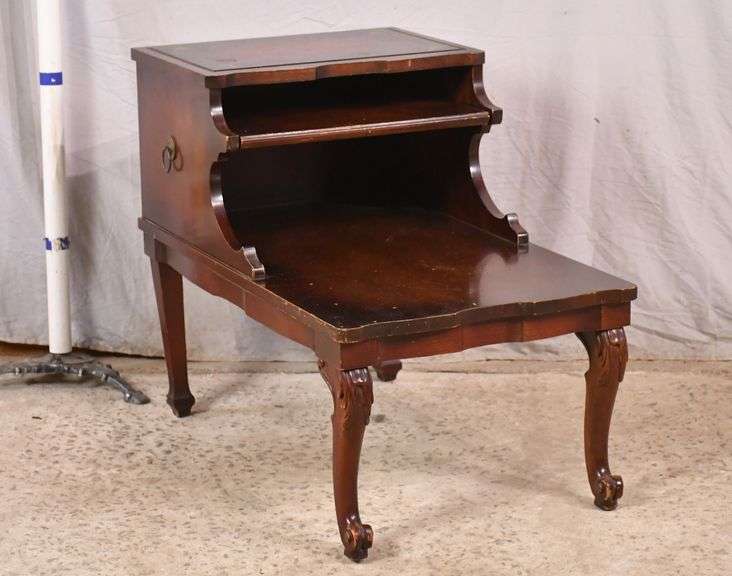 Mahogany step-back side table with leather top and slide-out shelf; 55 ...