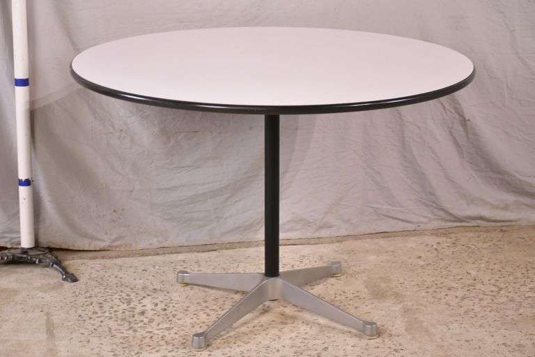 Herman Miller round white Formica top table with metal pedestal base ...