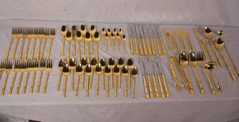 Set of Supreme Vermai gold toned flatware with caned cut handles; 14631 ...