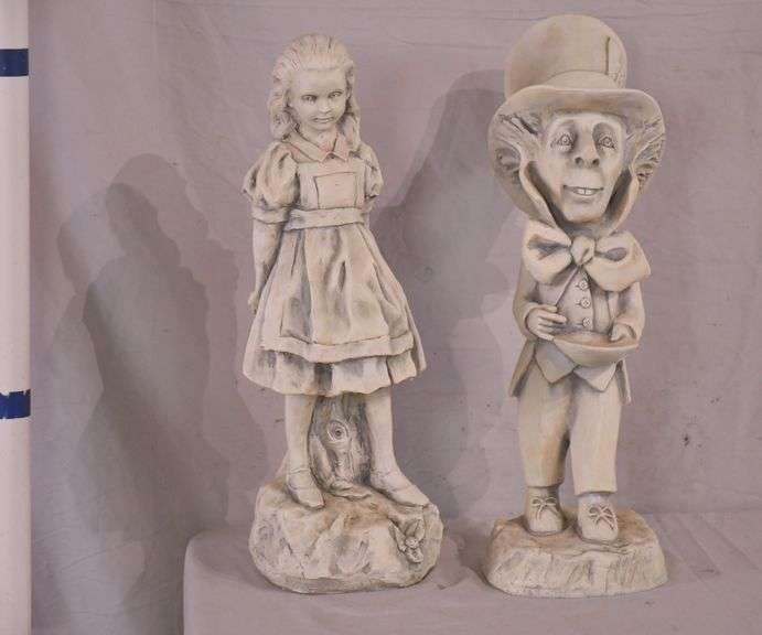 Pair of small plaster statues of "Alice in Wonderland" characters ...